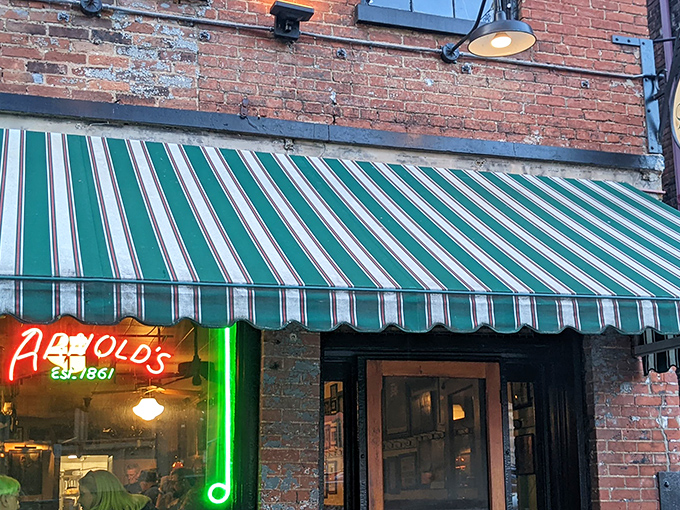 That iconic neon sign under the green and white awning isn't just advertising &ndash; it's a beacon of culinary hope in downtown Cincinnati.