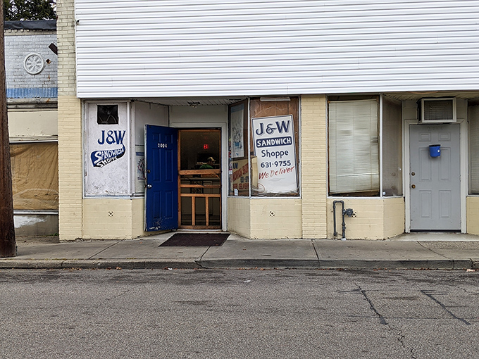 The unassuming blue door of J&W Sandwich Shoppe beckons like a secret handshake. No fancy frills, just sandwich perfection waiting inside this Norwood treasure.