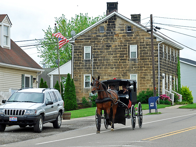 Where modern meets tradition on Winesburg's main street. That stone building has probably witnessed more history than most of our family photo albums combined.