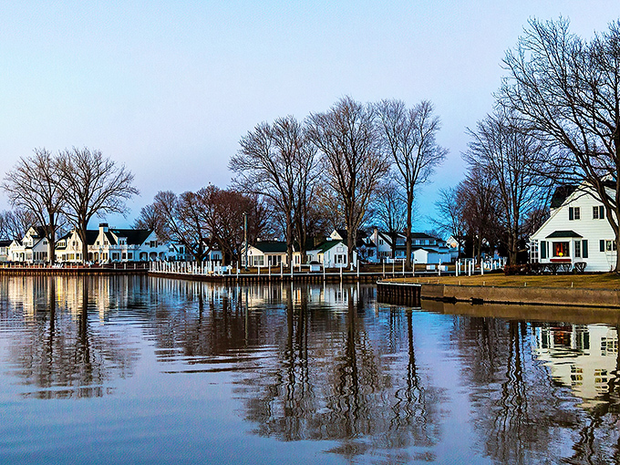 Waterfront homes create a perfect mirror image on the calm Vermilion River, proving that Ohio knows how to do lakeside living with quiet elegance.