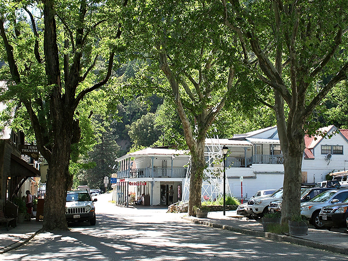 The same view from a different angle reveals the town's perfect nestling between mountains, like nature decided to create a cozy living room for humans.