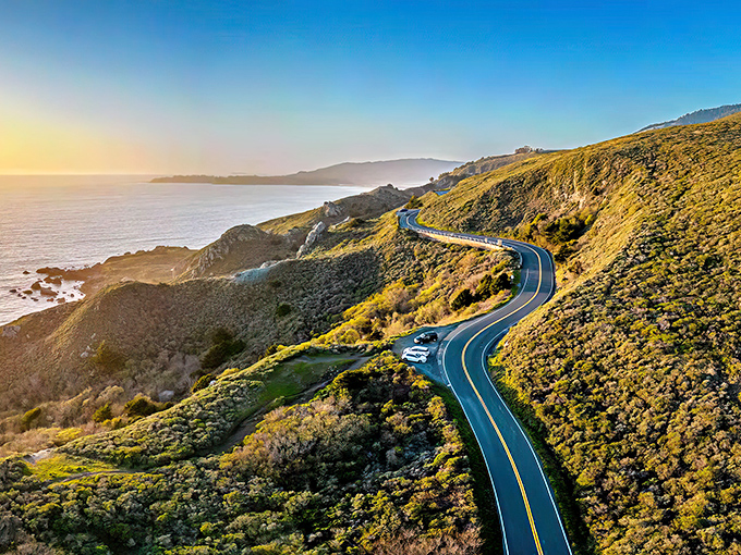 Highway 1 unfurls like nature's red carpet, hugging California's dramatic coastline. The road ahead promises adventures that no smartphone screen could ever do justice.