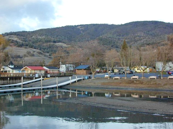Hillside homes with a view that makes you wonder why anyone pays Bay Area prices. Golden hills cradle modest dwellings overlooking paradise.
