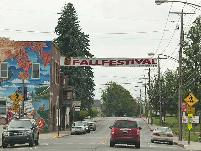 Mount Jewett welcomes visitors with small-town charm and a vibrant Fall Festival banner stretching across Main Street, promising autumn adventures ahead.