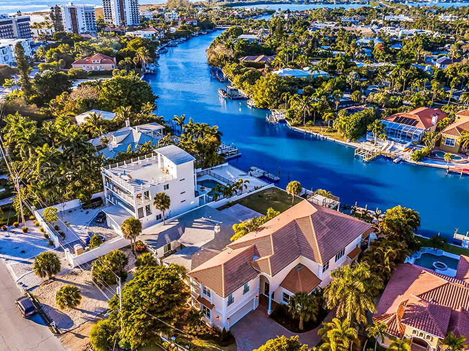 Sarasota's waterways weave through upscale neighborhoods like blue ribbons on a gift you can't wait to unwrap. Paradise with boat parking!