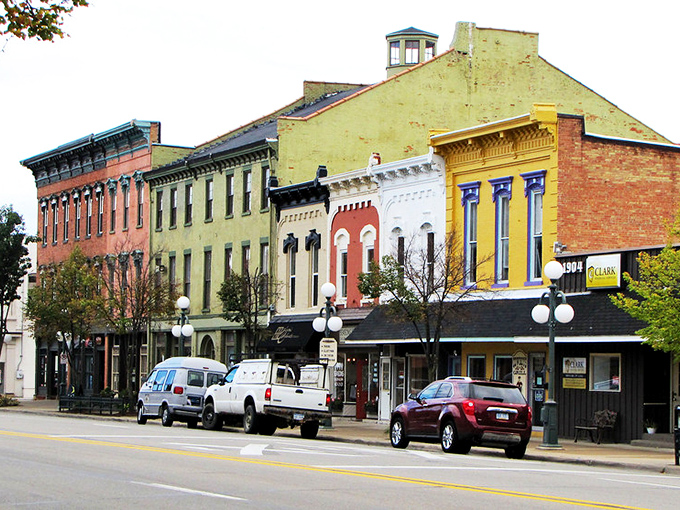 Downtown Tecumseh glows in golden hour light, its historic brick facades standing proud like sentinels of small-town charm that time forgot.