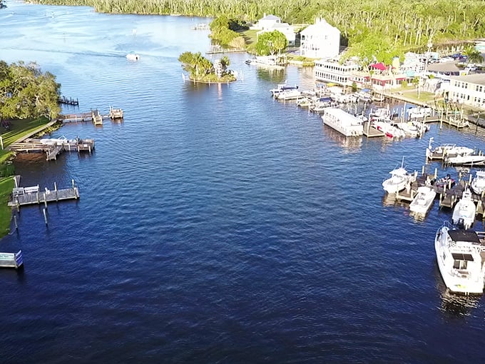 Crystal-clear waters where fishing boats dock like they're auditioning for a postcard competition.