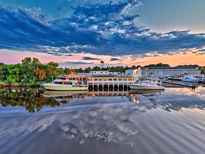 When sunset paints the Apalachicola River gold, even the fishing boats look like they're posing for postcards.