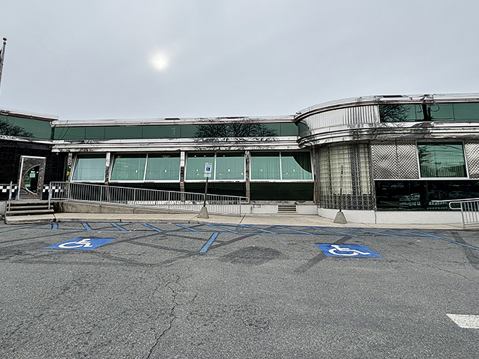 The mint-green exterior of Ham Fam stands like a time machine on Hamilton Street, promising comfort food that transcends decades of dining trends.