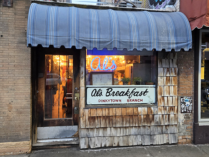 The iconic blue-striped awning of Al's Breakfast stands as a beacon of hope for hungry Minnesotans. This tiny Dinkytown institution has been worth the wait for generations.