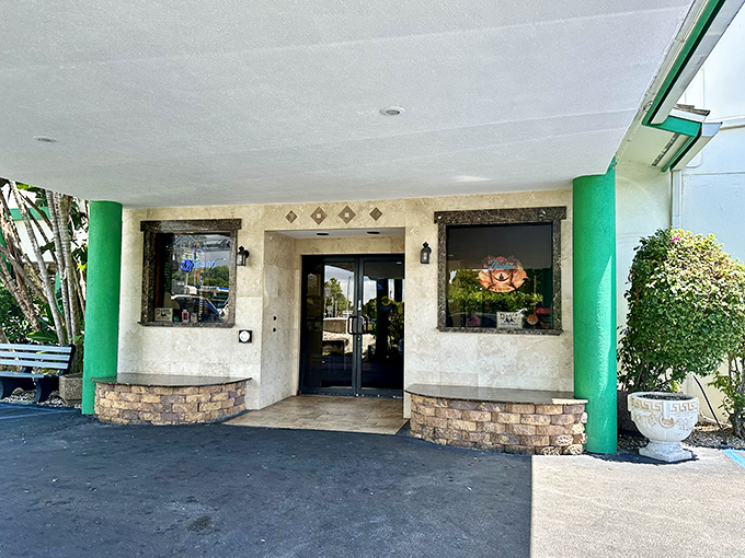 The unassuming exterior with its distinctive green pillars might not scream "culinary wonderland," but locals know better. Neverland for breakfast lovers awaits inside.