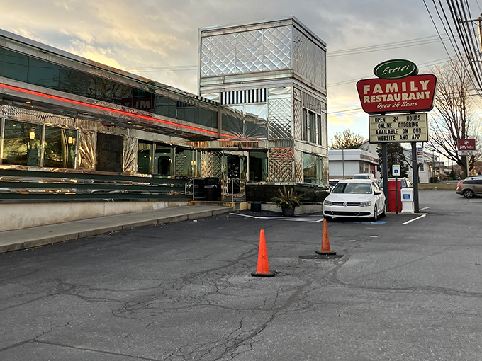 The gleaming chrome exterior of Exeter Family Restaurant shines like a beacon of hope for hungry travelers&mdash;a classic diner promising comfort in metallic splendor.
