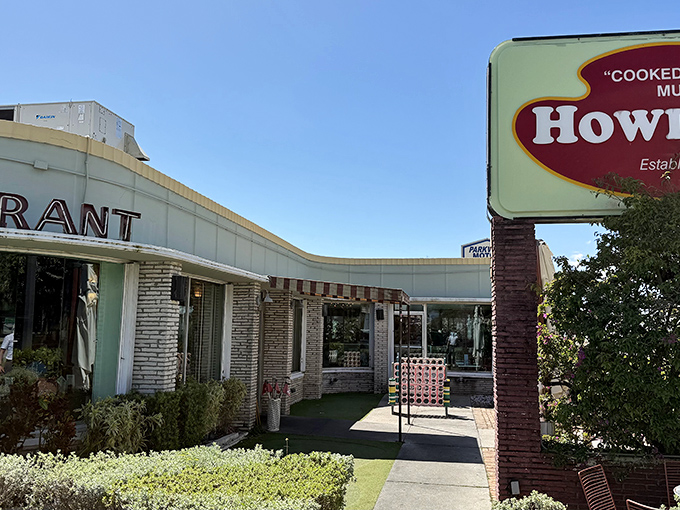 That mint-green curved facade of Howley's exterior promise a time-travel experience that your taste buds will thank you for. Established 1950 and still rocking that vintage charm!