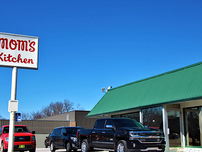 The classic red-lettered sign against a brilliant Kansas sky promises what every food lover seeks: comfort without pretension. 