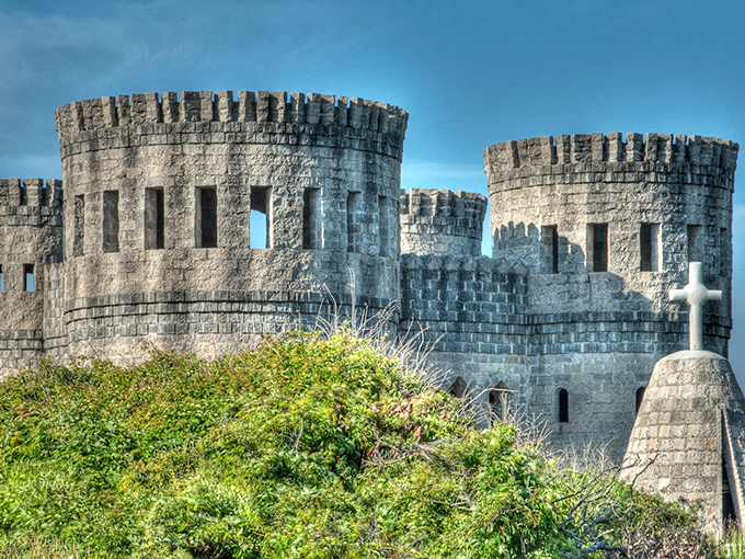 Castle Otttis rises from the Florida landscape like a medieval mirage, its stone towers defying both time and geography with stubborn, magnificent charm.