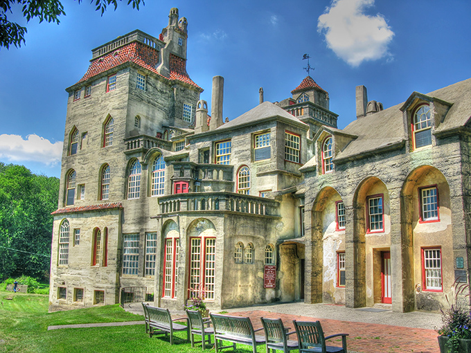 Fonthill Castle stands like a medieval fever dream in suburban Pennsylvania, its concrete towers and red-tiled roofs defying architectural convention with magnificent audacity.