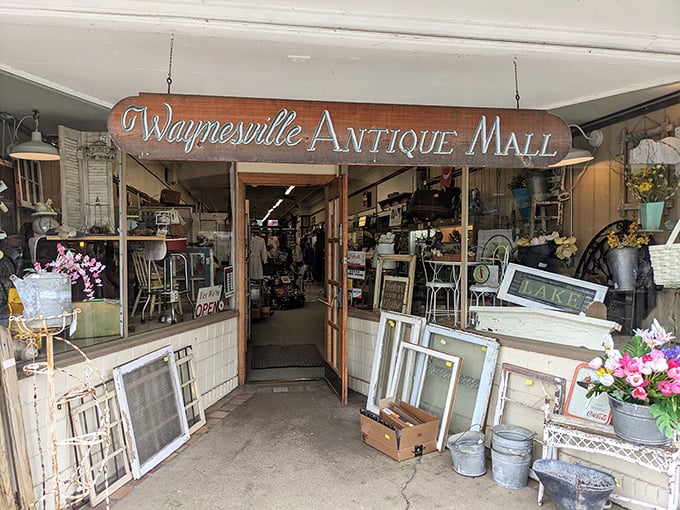 The iconic storefront beckons with vintage charm &ndash; that green cart practically whispering, "Come find your next conversation piece inside!"