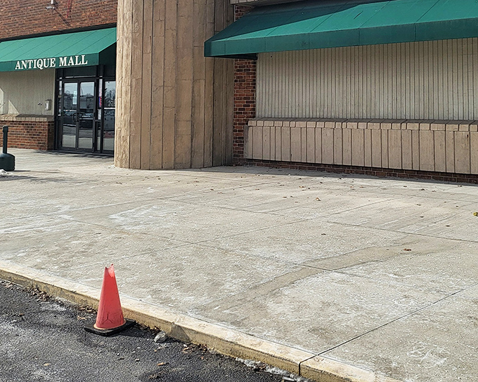 The unassuming entrance belies the wonderland within, like finding Narnia behind a modest wardrobe door in suburban Ohio.