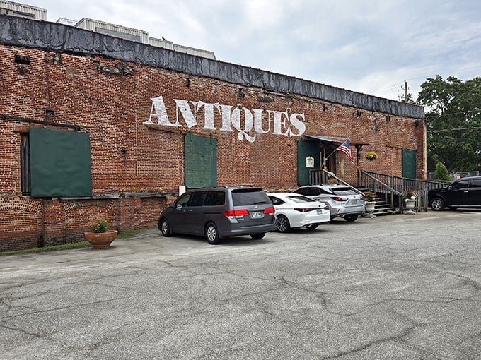 The brick exterior boldly announces "ANTIQUES" like a time-travel invitation written in giant letters. No DeLorean required&mdash;just an appreciation for history and comfortable walking shoes.