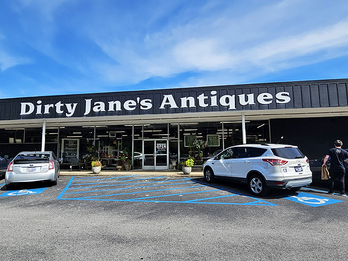 The blue storefront of Dirty Jane's beckons like a portal to the past, promising treasures that IKEA simply cannot provide.