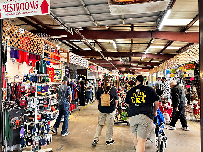 Shoppers navigate the bustling indoor aisles of Oldsmar Flea Market, where treasures await around every corner. The ultimate Florida bargain hunter's paradise.