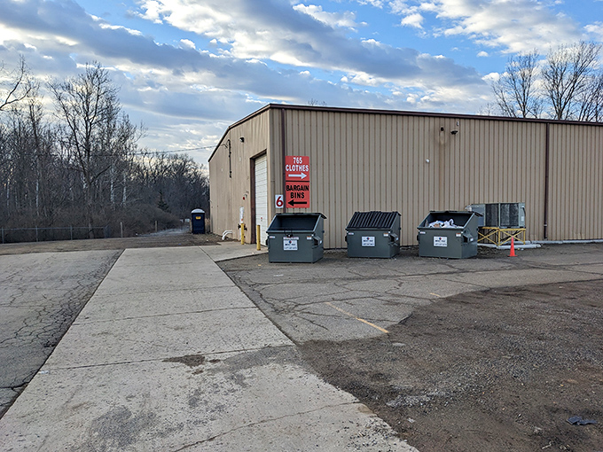 Around back, dumpsters await the rejects. Remember the saying: "One person's trash becomes another's Facebook Marketplace listing."