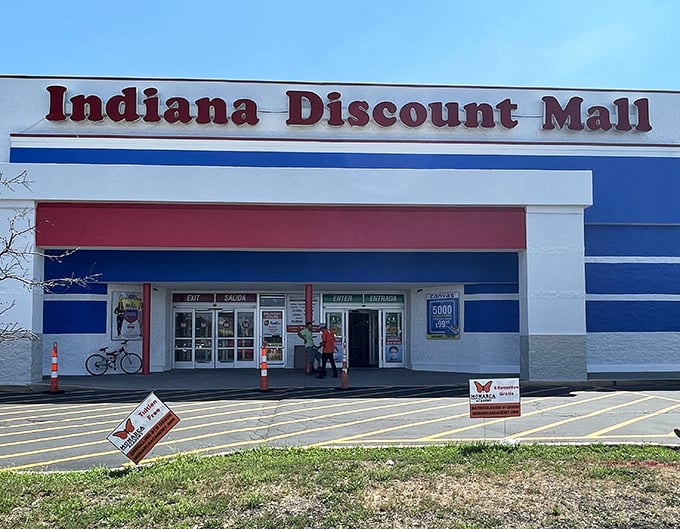 The red, white, and blue facade welcomes bargain hunters like a patriotic beacon of savings.