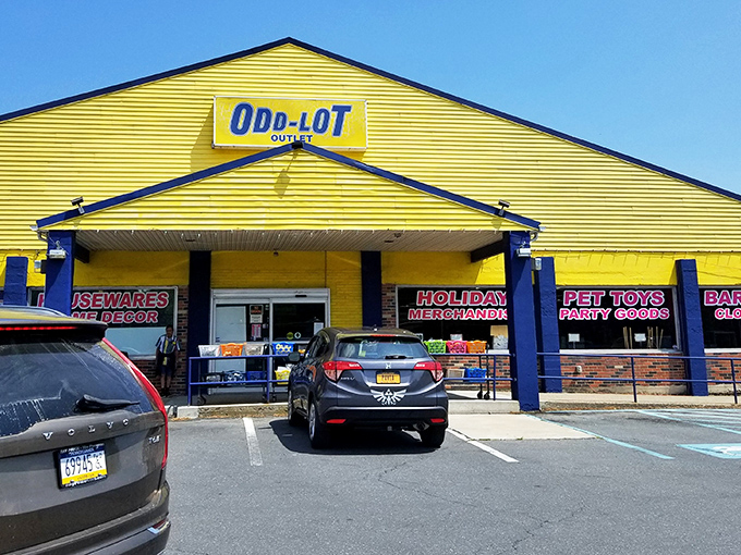 The sunshine-yellow exterior of Odd-Lot Outlet stands like a beacon of bargain hope in Tannersville, promising treasures that would make even the most frugal shopper giddy.