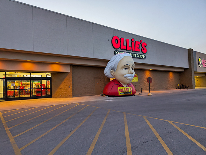 The iconic Ollie's mascot greets bargain hunters like a jolly discount guardian. That giant head knows you're about to save big on everything you didn't know you needed.