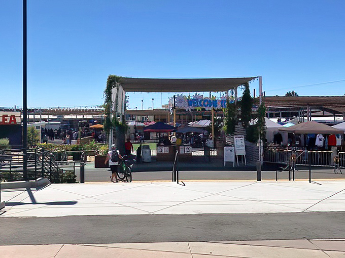 That cheerful "Welcome to The Flea Market" sign promises adventures your credit card will actually appreciate.