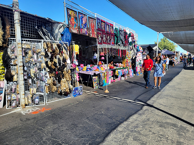 Vibrant religious icons and colorful trinkets line the walkway, where every stall feels like opening a treasure chest of cultural artifacts.