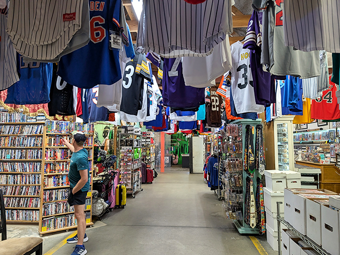 Sports fans, rejoice! This aisle is where forgotten jerseys find new life and DVD collections rival streaming services. Treasure hunting at its finest.