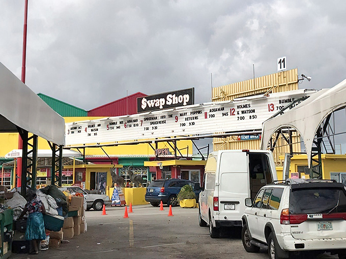 The iconic Swap Shop sign welcomes treasure hunters with movie listings—because why choose between bargain hunting and cinema when you can have both?