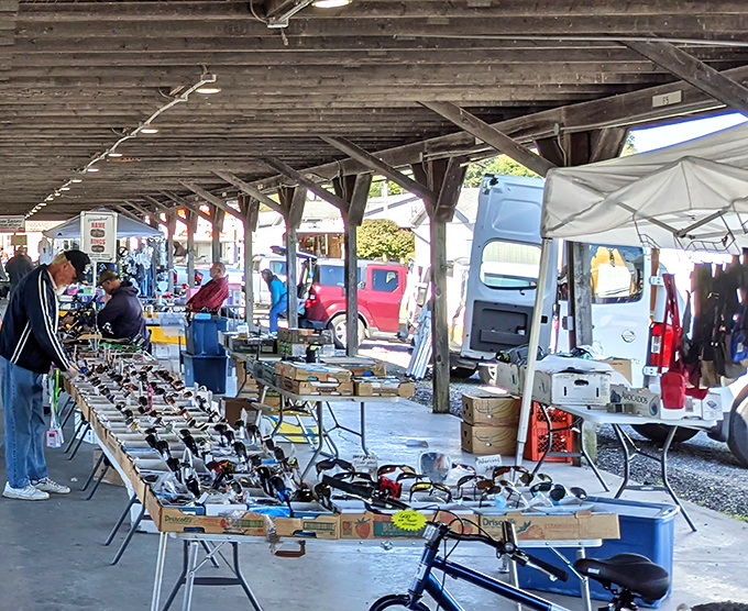 The covered pavilions of Rogers Flea Market offer treasure hunters shade while they search for deals. Like a small city of commerce that appears every Friday morning.