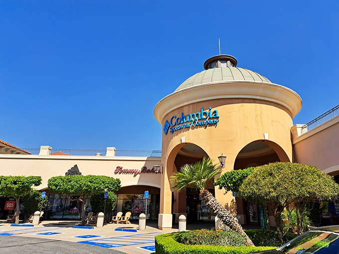 The Mediterranean-inspired architecture of Desert Hills Premium Outlets stands like a retail mirage in the desert, promising treasures within its domed entrances.