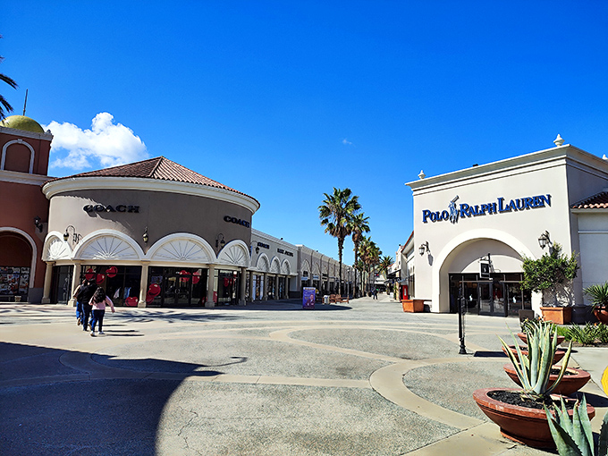 Spanish-style architecture under perfect San Diego skies &ndash; Coach and Polo Ralph Lauren face off in a battle of discounted luxury that everyone wins.