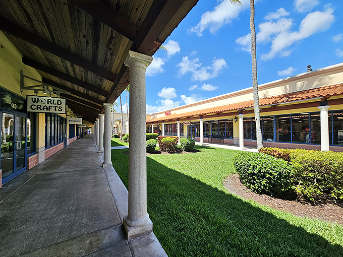 The World Crafts storefront beckons with its shaded walkway and lush landscaping&mdash;proof that outlet shopping doesn't have to feel like a fluorescent-lit endurance test.