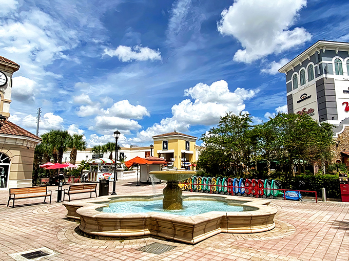 A picturesque courtyard complete with bubbling fountain offers shoppers a tranquil moment to rest weary feet and contemplate their next retail conquest.