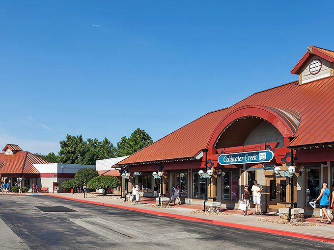 The distinctive copper rooftops and rustic stone pillars of Osage Beach Outlet Marketplace create a shopping village that's more charming than your average mall experience.