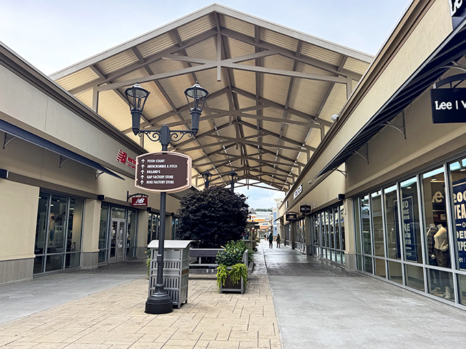 The covered walkways at Tanger Outlets Asheville aren't just practical—they're retail genius, ensuring your shopping marathon continues rain or shine.