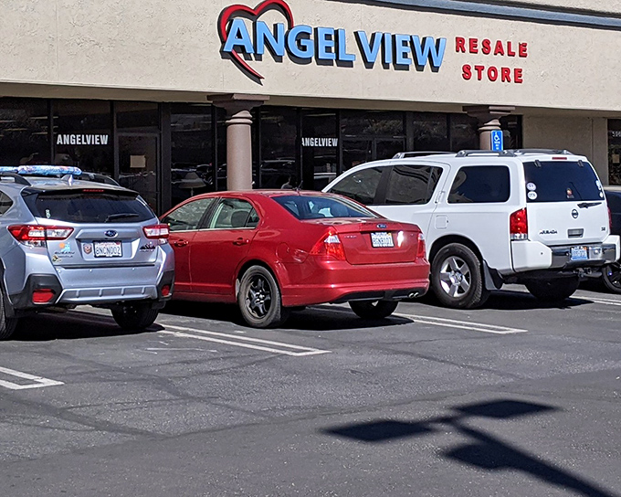 The unassuming storefront of Angel View Resale Store beckons with its cheerful signage, promising treasures within that won't break your desert-parched wallet.