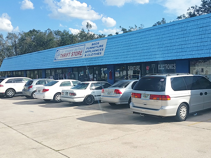 The bright blue awning of St. Vincent de Paul beckons like a thrift oasis in Apopka, promising treasures that won't break your vacation budget.