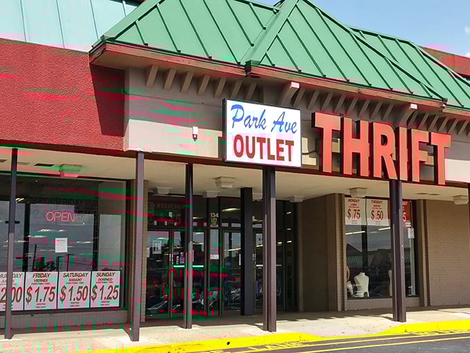 The unmistakable red and green facade of Park Avenue Thrift Outlet stands like a beacon for bargain hunters, promising treasures waiting to be discovered inside.