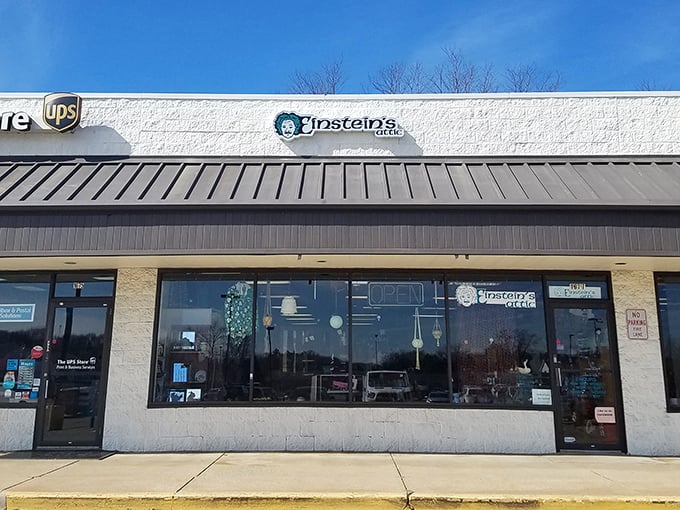 Einstein's Attic storefront beckons with the promise of treasures within. The unassuming strip mall location hides a wonderland of secondhand delights waiting to be discovered.