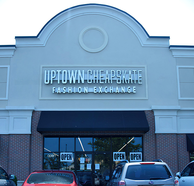 The iconic storefront beckons like a fashion oasis in the desert of retail prices. Uptown Cheapskate's curved architecture promises treasures within.
