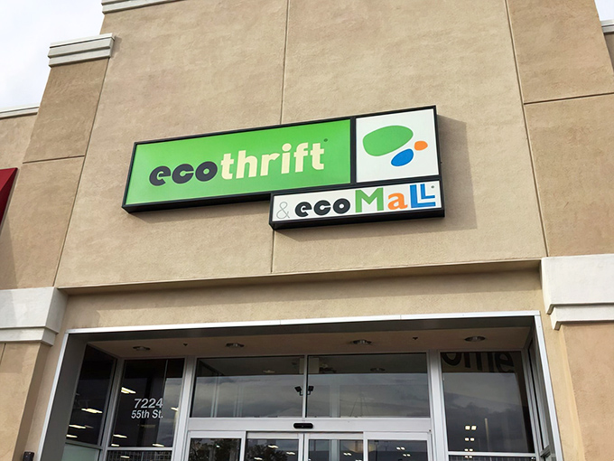 The bright green Eco Thrift sign beckons like a beacon of bargain hope against the beige building. Treasure hunting starts here!