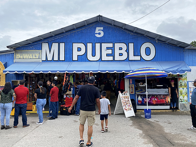 The iconic blue facade of Mi Pueblo's Building 5 beckons shoppers like a retail siren song, promising treasures within its bustling interior.