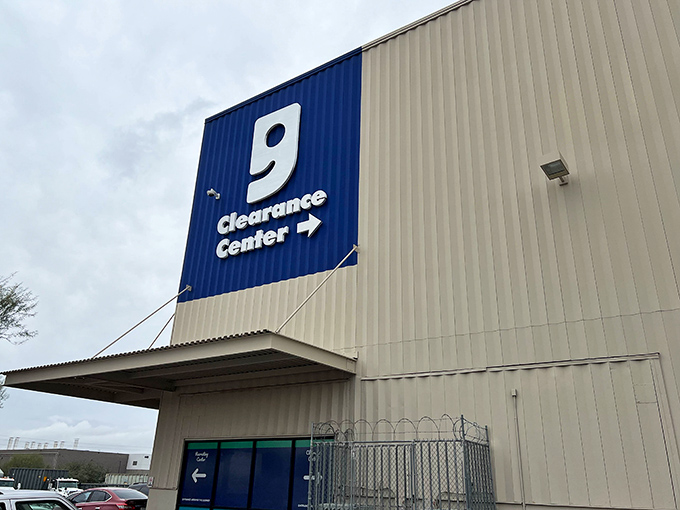 The iconic blue Goodwill logo beckons like a siren call to bargain hunters. This unassuming warehouse exterior hides a treasure trove waiting to be discovered.