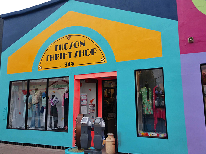 The turquoise facade of Tucson Thrift Shop pops against the desert landscape like a fashion oasis, promising treasures within its vibrant walls.