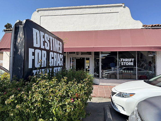 The unassuming storefront with its bold black sign and red awning beckons like a siren song to bargain hunters and treasure seekers alike.